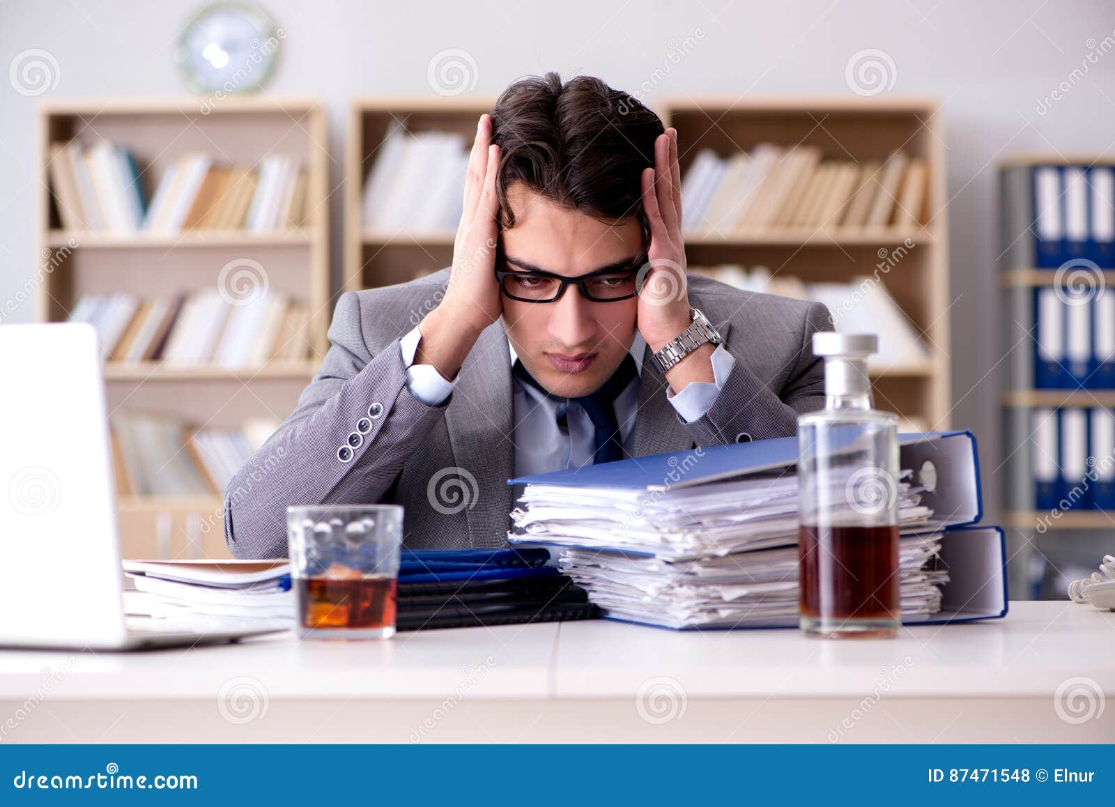 The Young Businessman Drinking from Stress Stock Photo - Image of ...