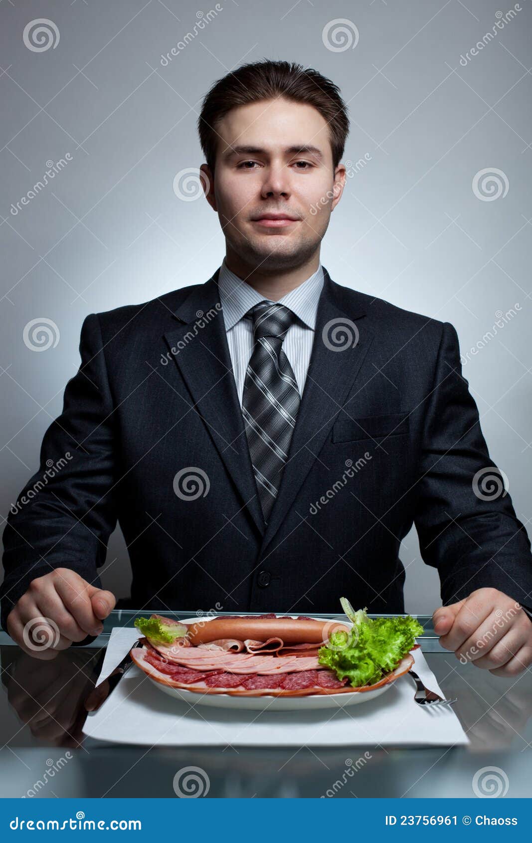 Young businessman eating stock image. Image of lunch - 23756961