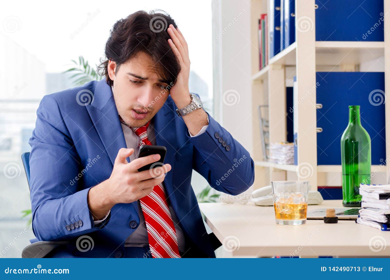 The Young Businessman Employee Drinking in the Office Stock Image ...