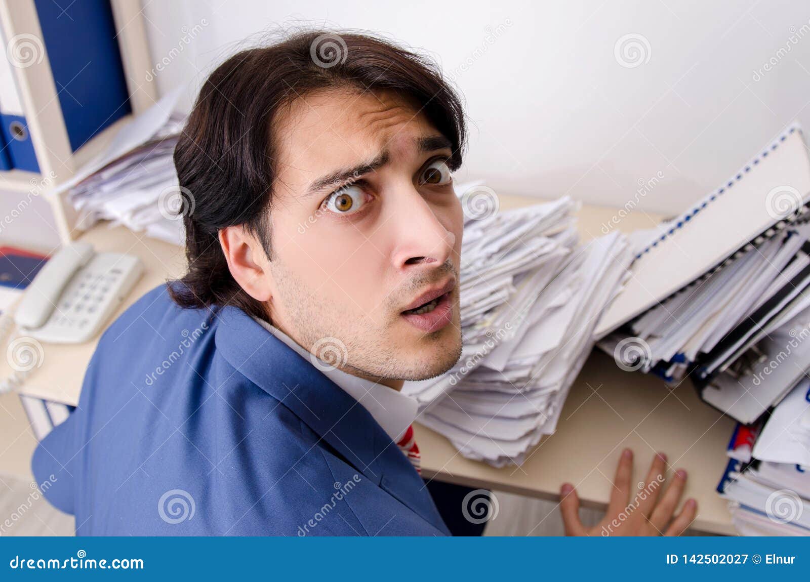 The Young Businessman Employee Unhappy with Excessive Work Stock Image ...