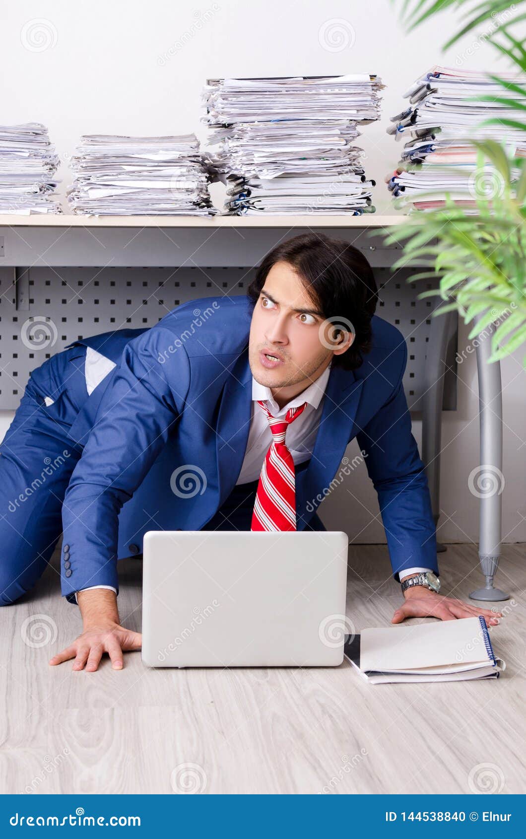 The Young Businessman Employee Unhappy with Excessive Work Stock Photo ...