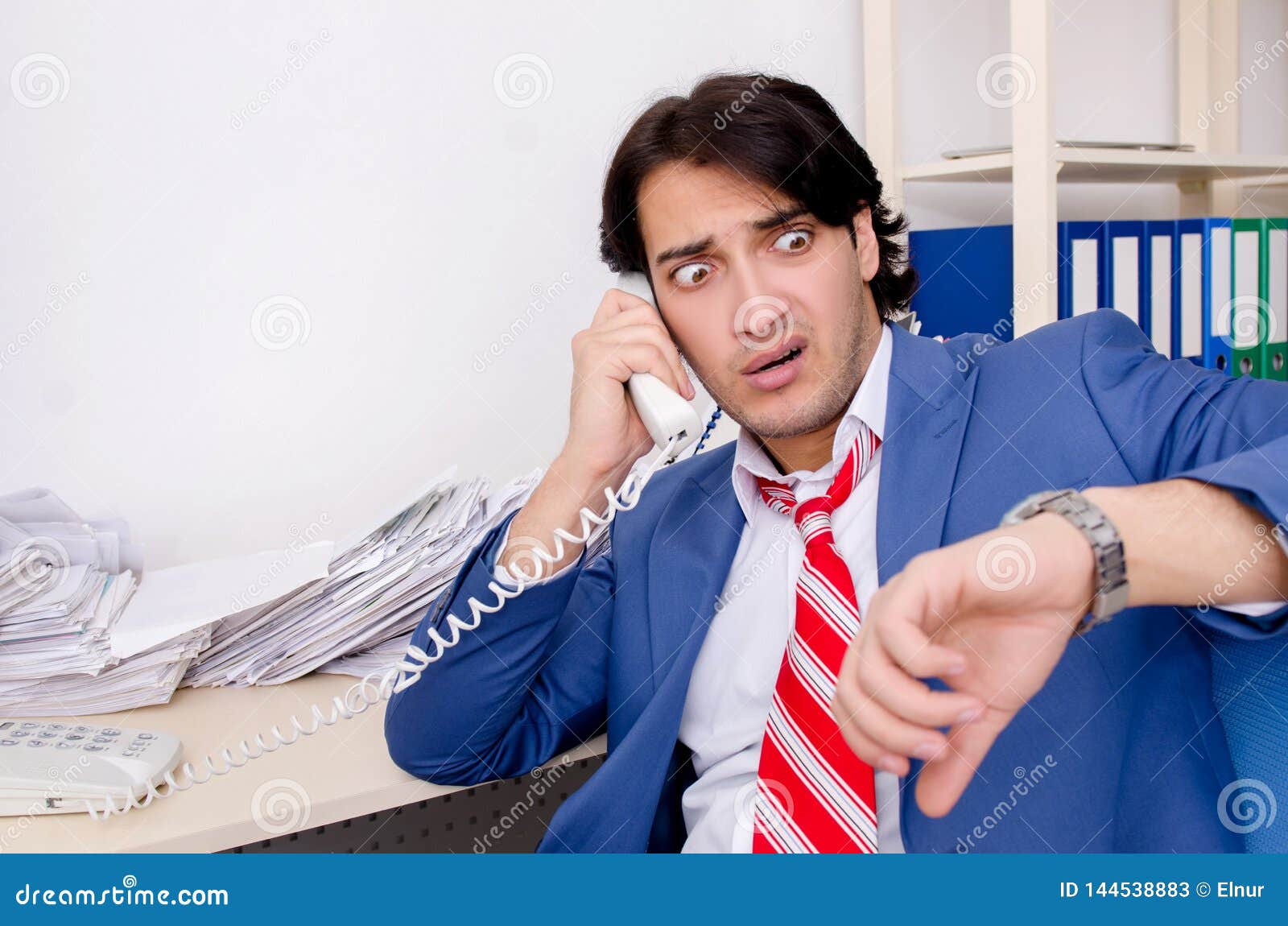 The Young Businessman Employee Unhappy with Excessive Work Stock Image ...