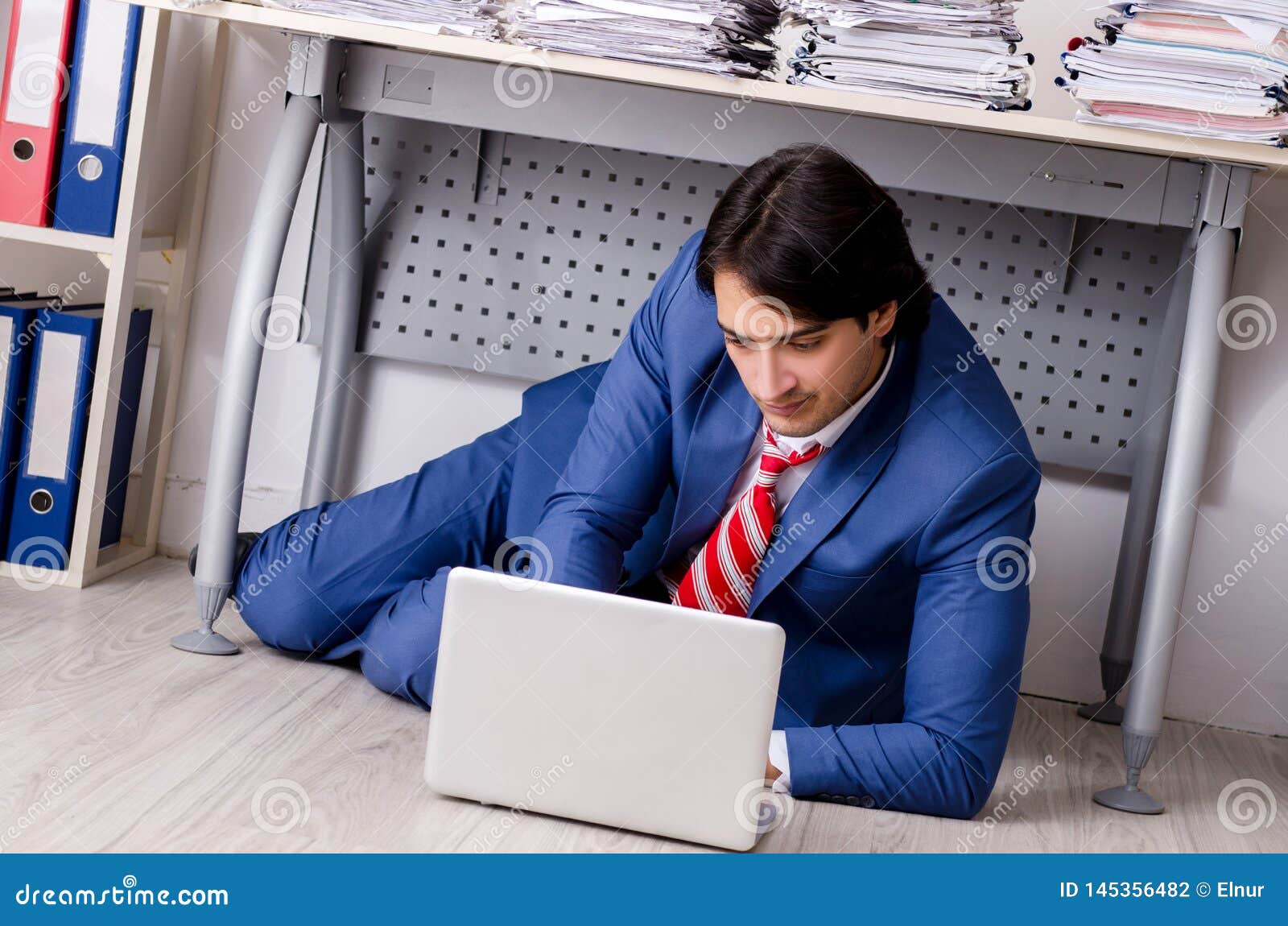 The Young Businessman Employee Unhappy with Excessive Work Stock Photo ...