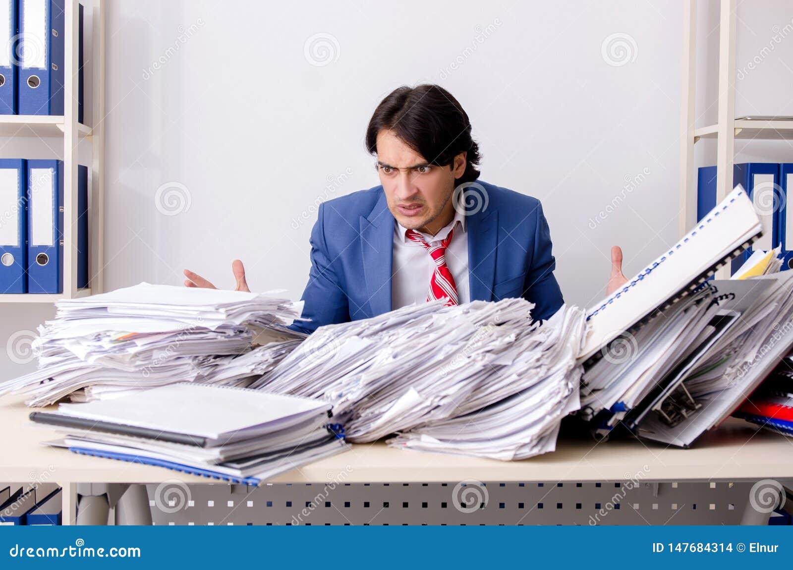 The Young Businessman Employee Unhappy with Excessive Work Stock Photo ...