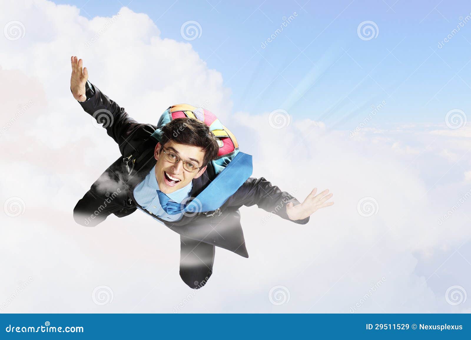 Young Businessman Flying with Parachute on Back Stock Image - Image of ...