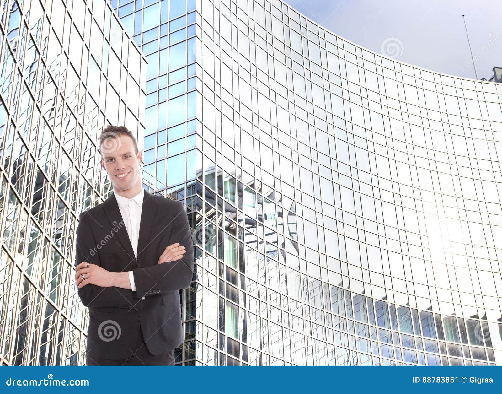 Young Businessman in Front of Office Building Stock Image - Image of ...