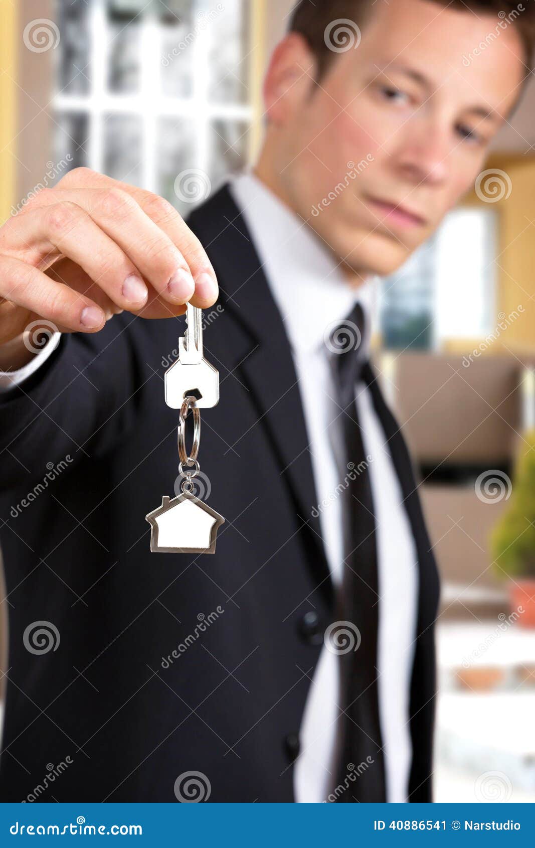 Young Businessman Giving House Keys Stock Image - Image of capability ...