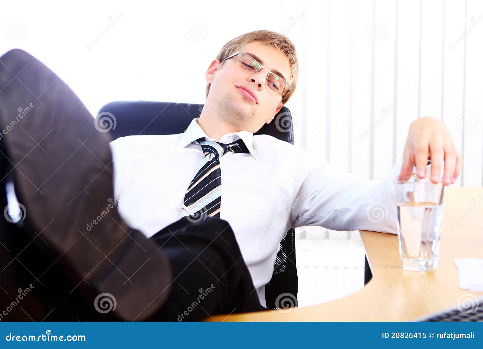 Young Businessman Having Rest Stock Image - Image of boss, employer ...