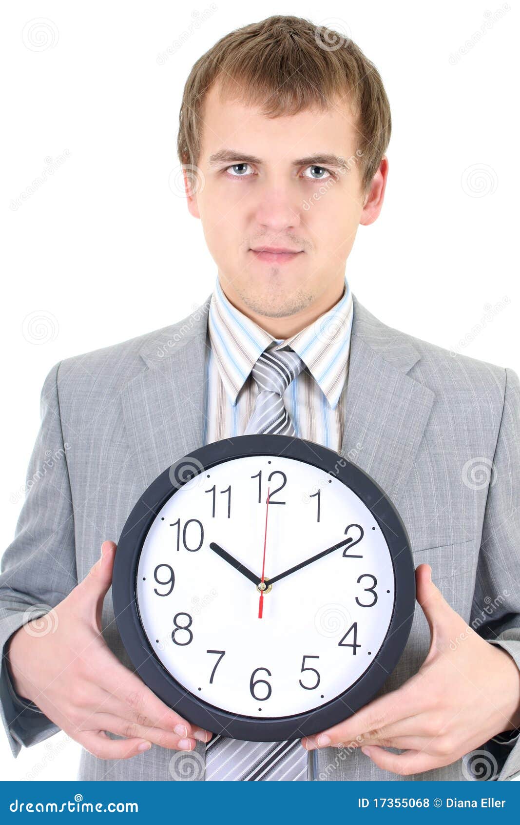 Young Businessman Holding a Clock Stock Photo - Image of punctual ...