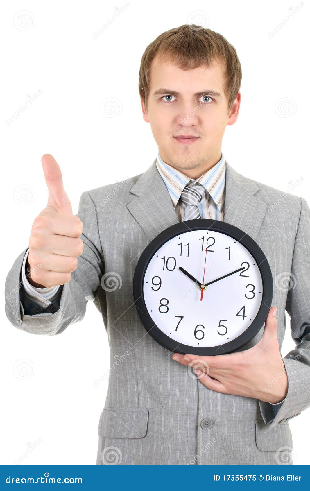 Young Businessman Holding a Clock Stock Image - Image of finger, happy ...