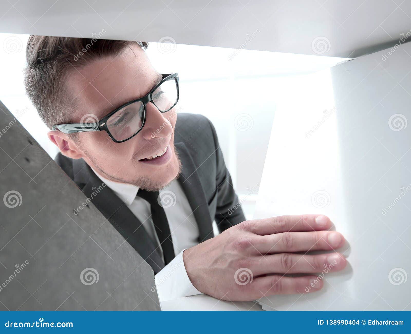 Man in Glasses at the Office Looking for Documents Stock Photo - Image ...