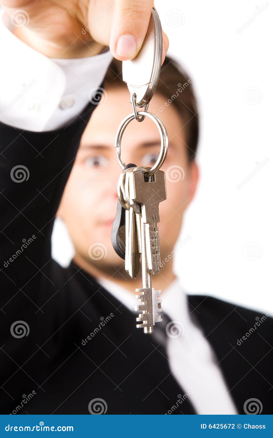 Young Businessman Holding Keys Stock Photo - Image of finger, business ...