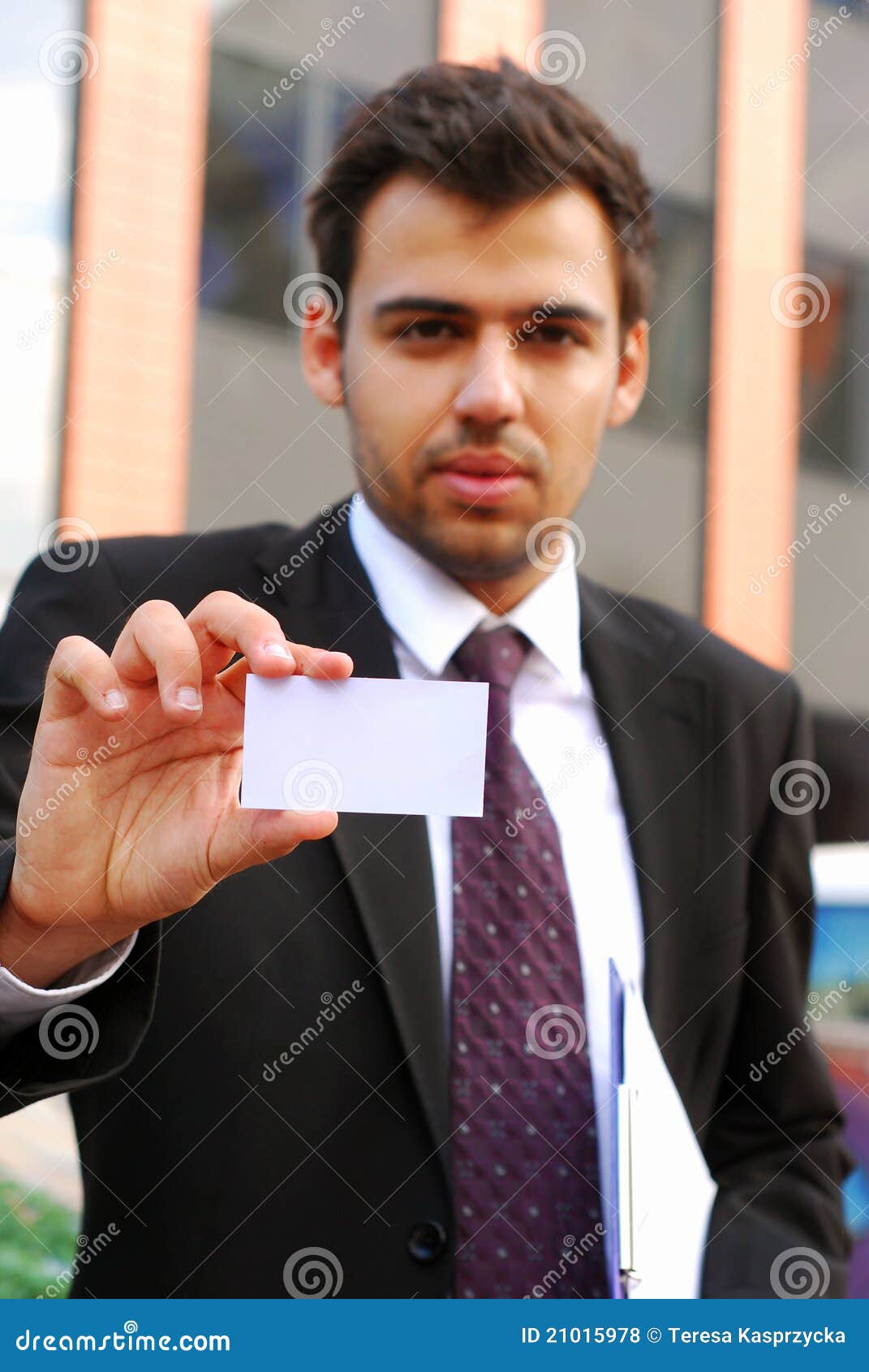 Young Businessman Holding Visit Card Stock Photo - Image of attractive ...