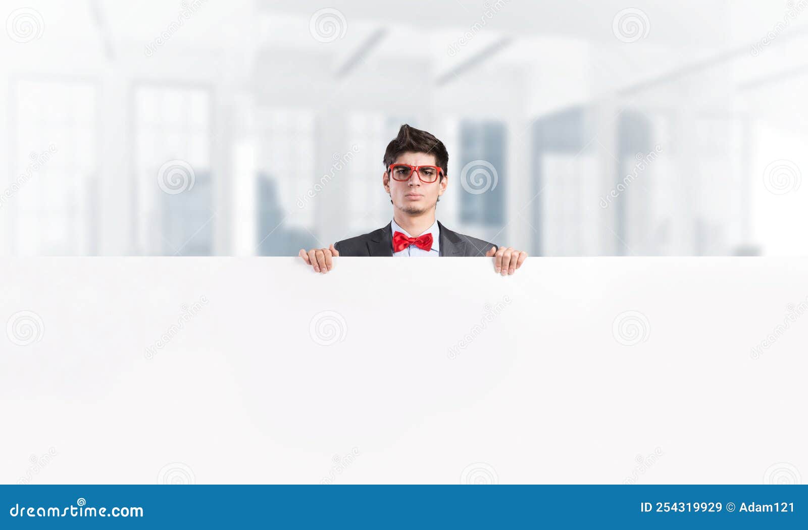 Young Businessman Holds a Banner Stock Image - Image of advertisement ...