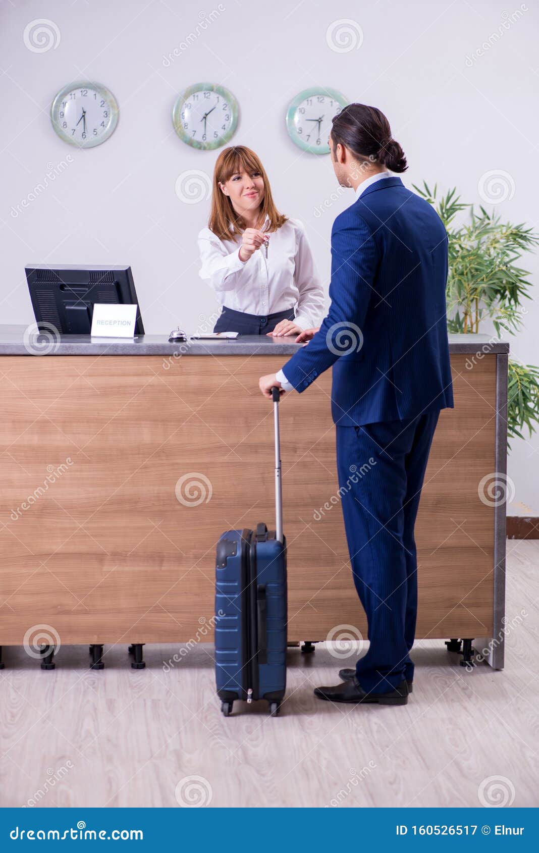Young Businessman at Hotel Reception Stock Image - Image of hostel ...
