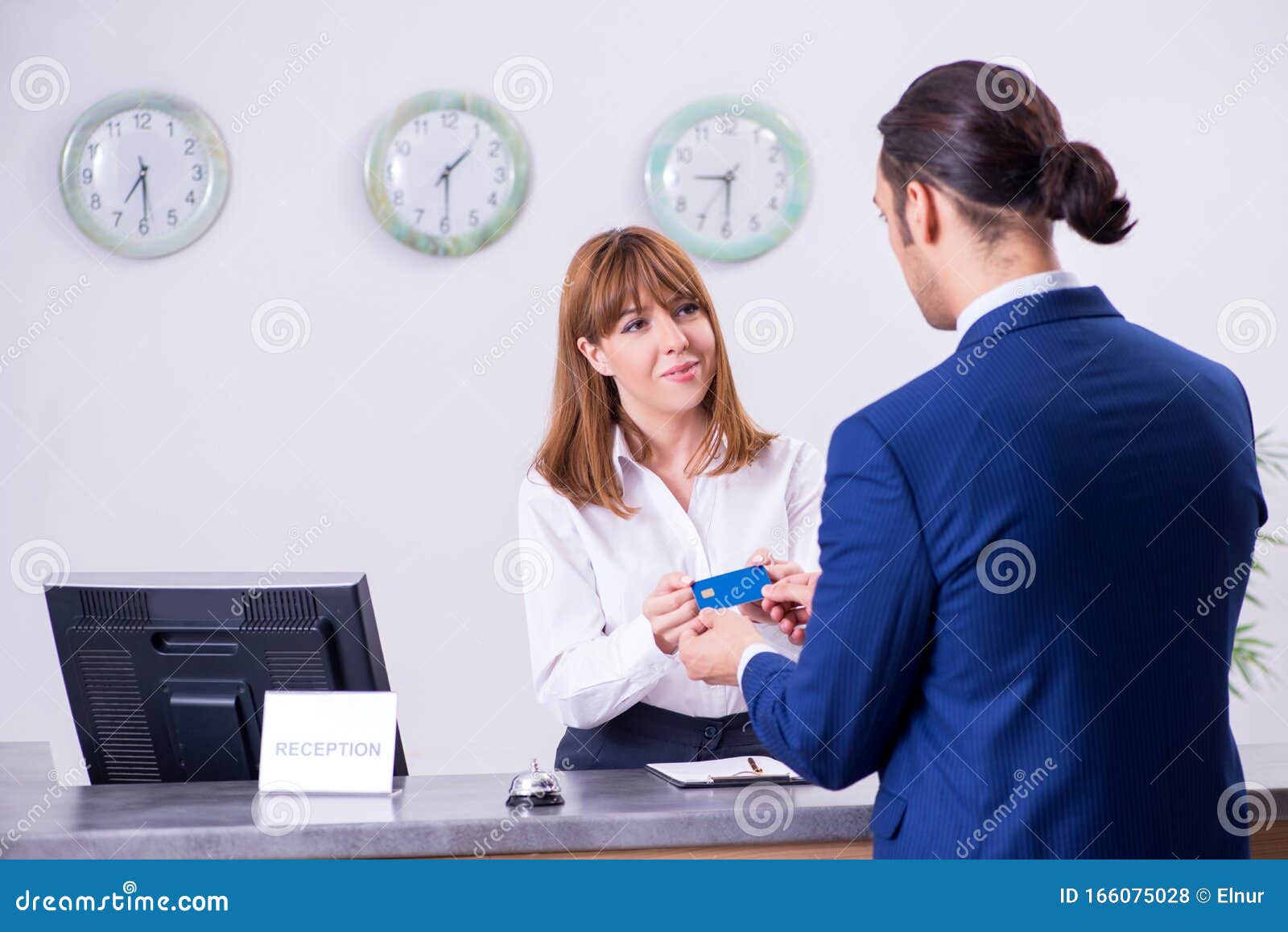 Young Businessman at Hotel Reception Stock Photo - Image of lobby ...