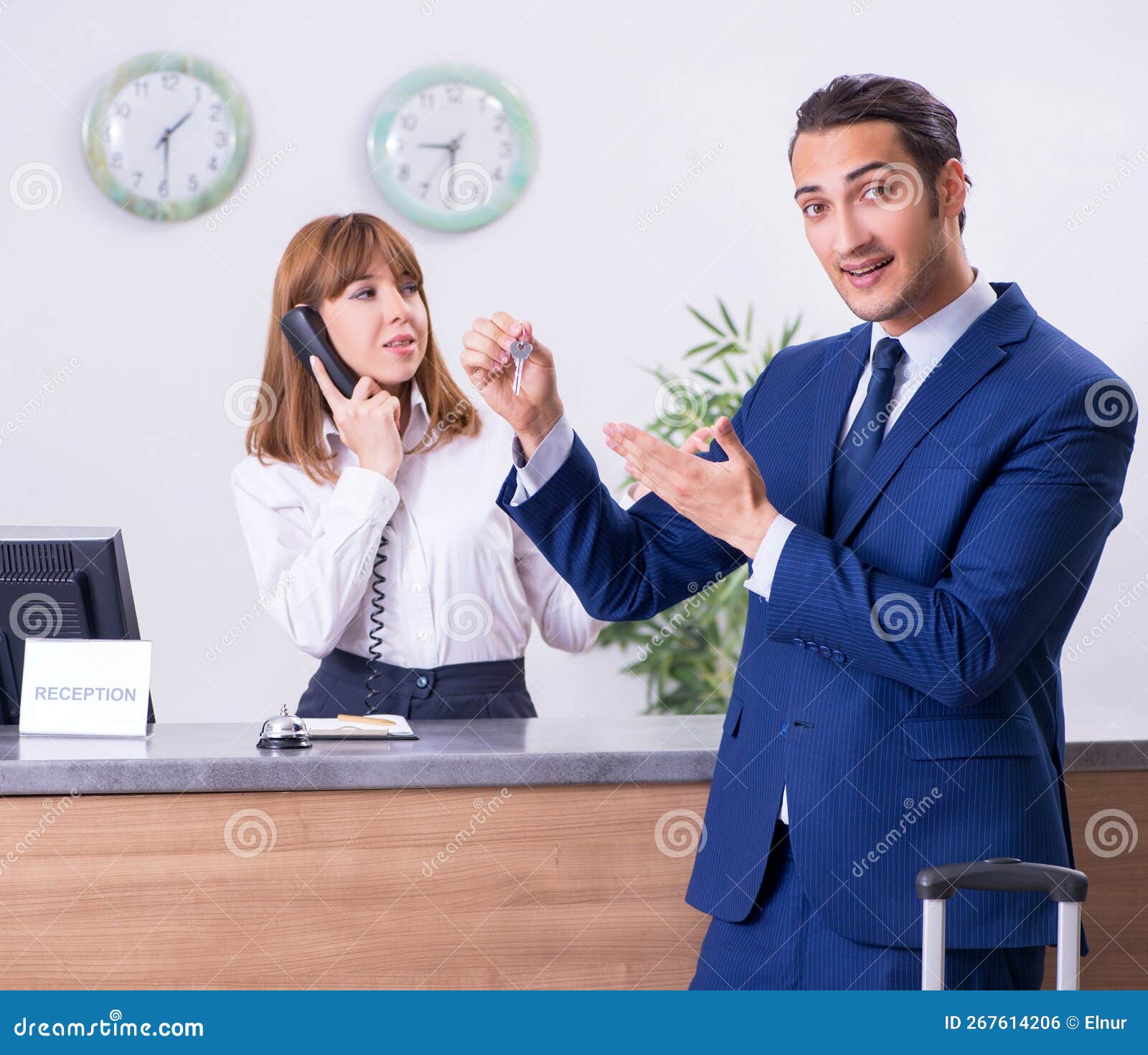 Young Businessman at Hotel Reception Stock Photo - Image of employee ...