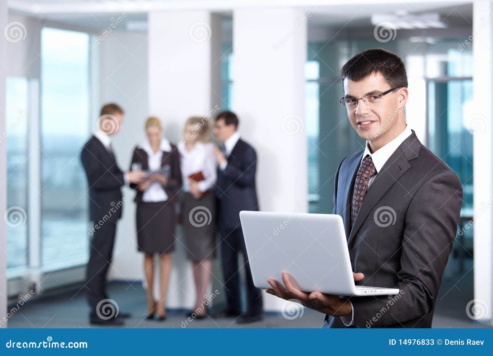 Young Businessman with Laptop Stock Image - Image of business ...