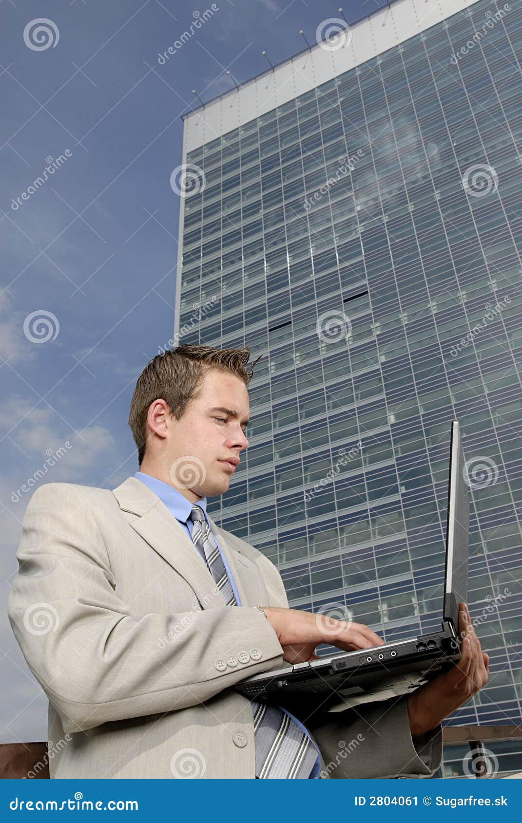 Young Businessman with Laptop Stock Image - Image of finance ...
