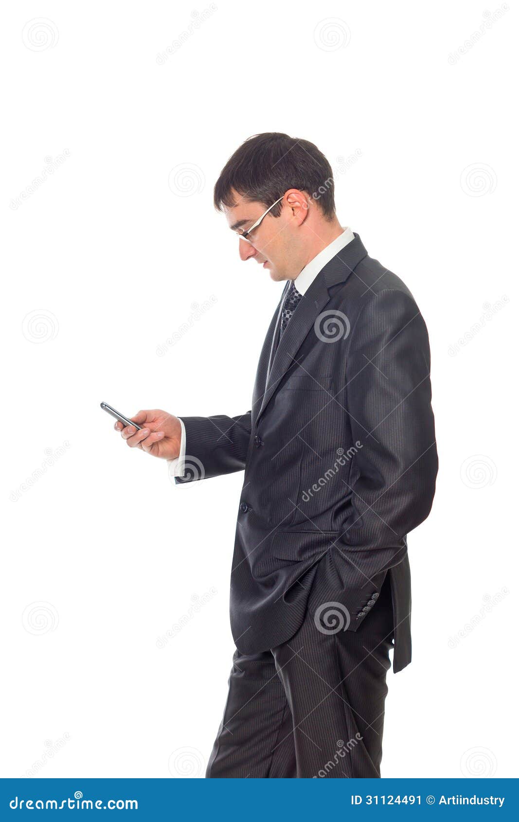 Young Businessman Looking at Cell Phone Stock Image - Image of global ...