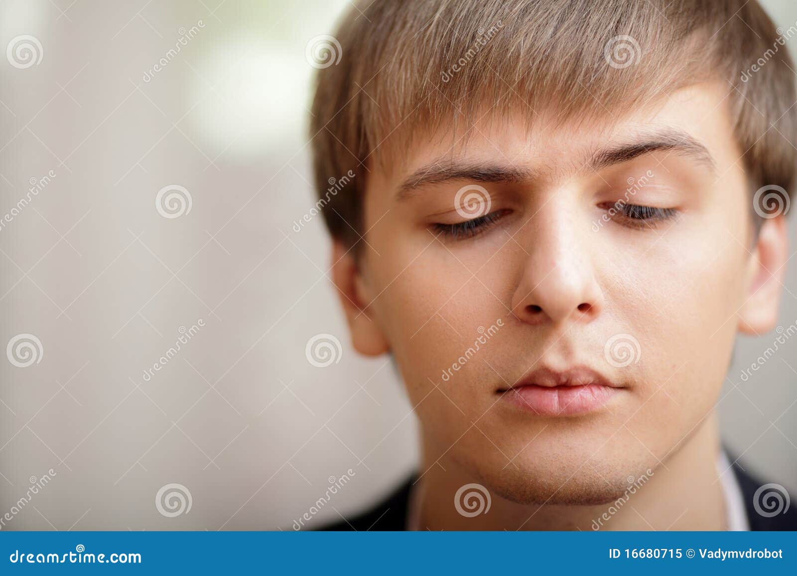 Young Businessman Looking Down Stock Image - Image of suspect, face ...