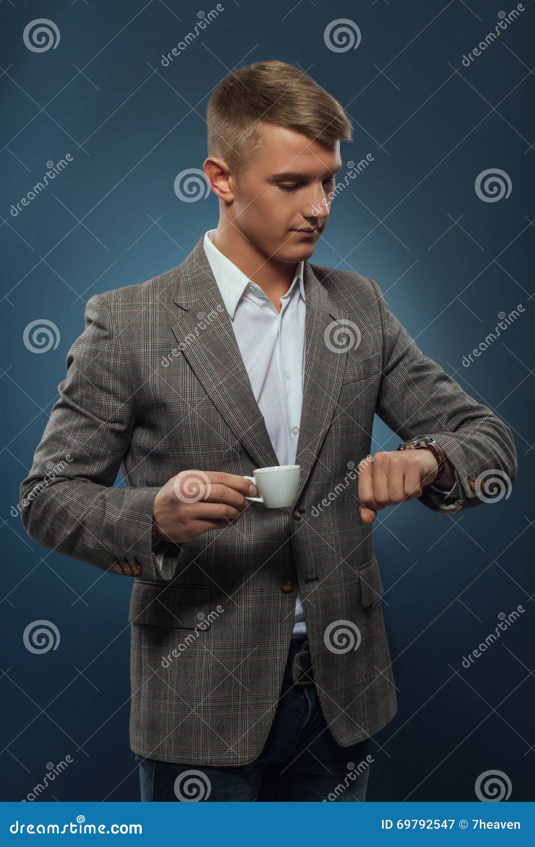 Young Businessman Looking at His Watch Stock Image - Image of ...