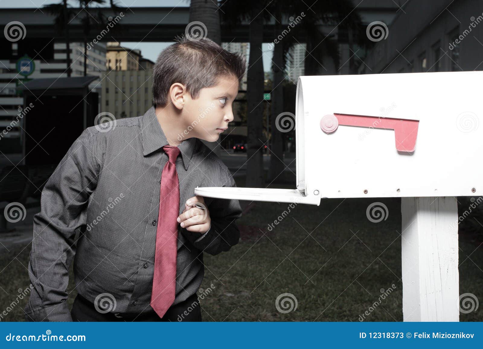 Young Businessman Looking in a Mailbox Stock Image - Image of business ...