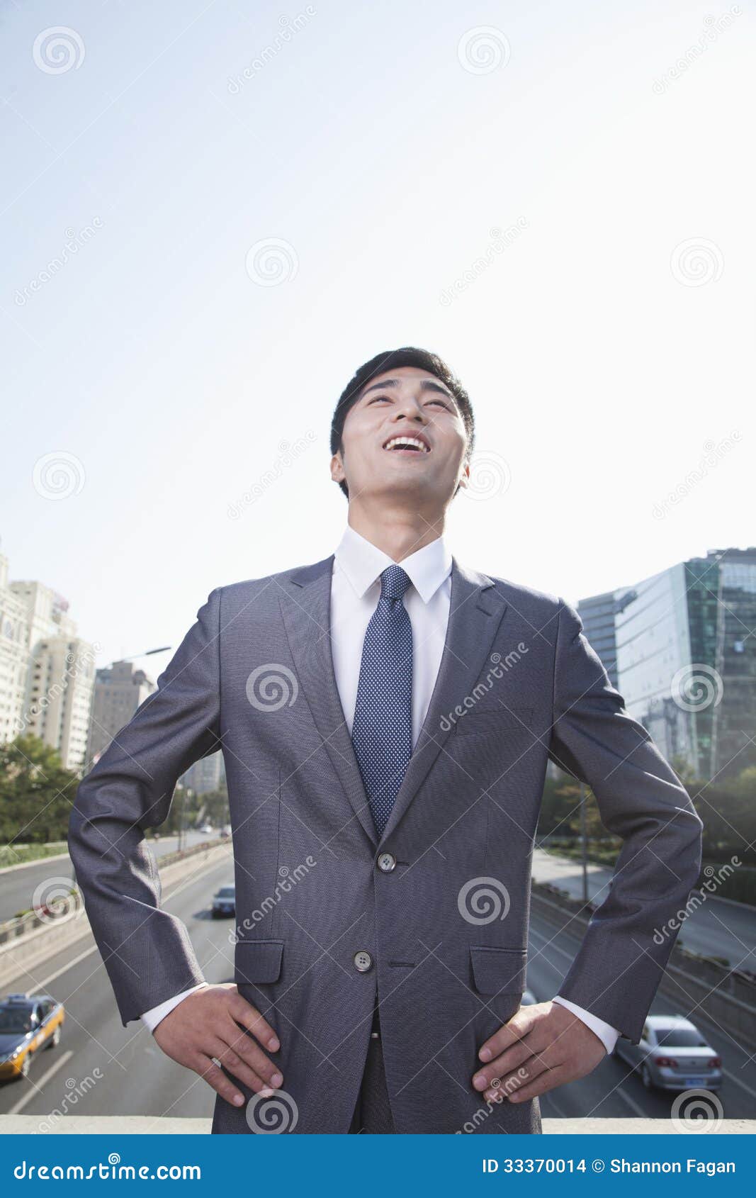 Young Businessman Looking Up Stock Photo - Image of 2024, optimism ...