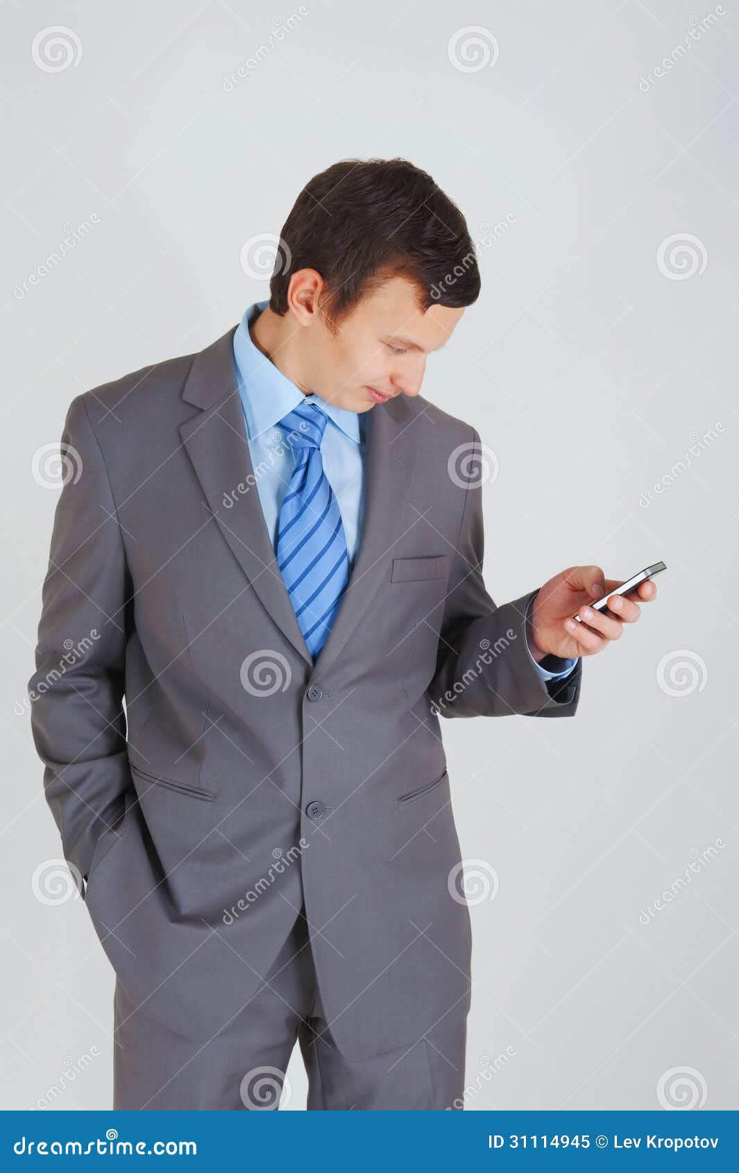 Young Businessman with Mobile Phone Stock Image - Image of male, phone ...