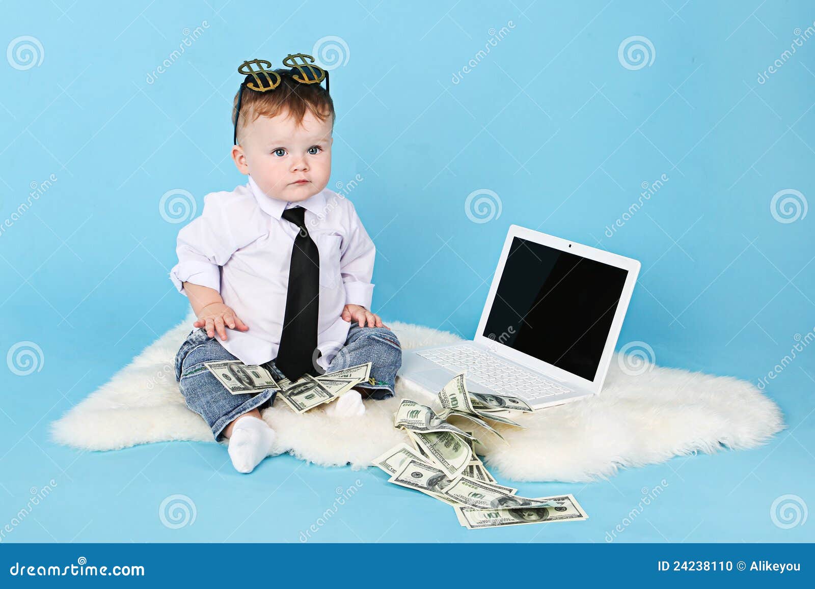 Young Businessman with Money and a Lap Stock Photo - Image of jeans ...