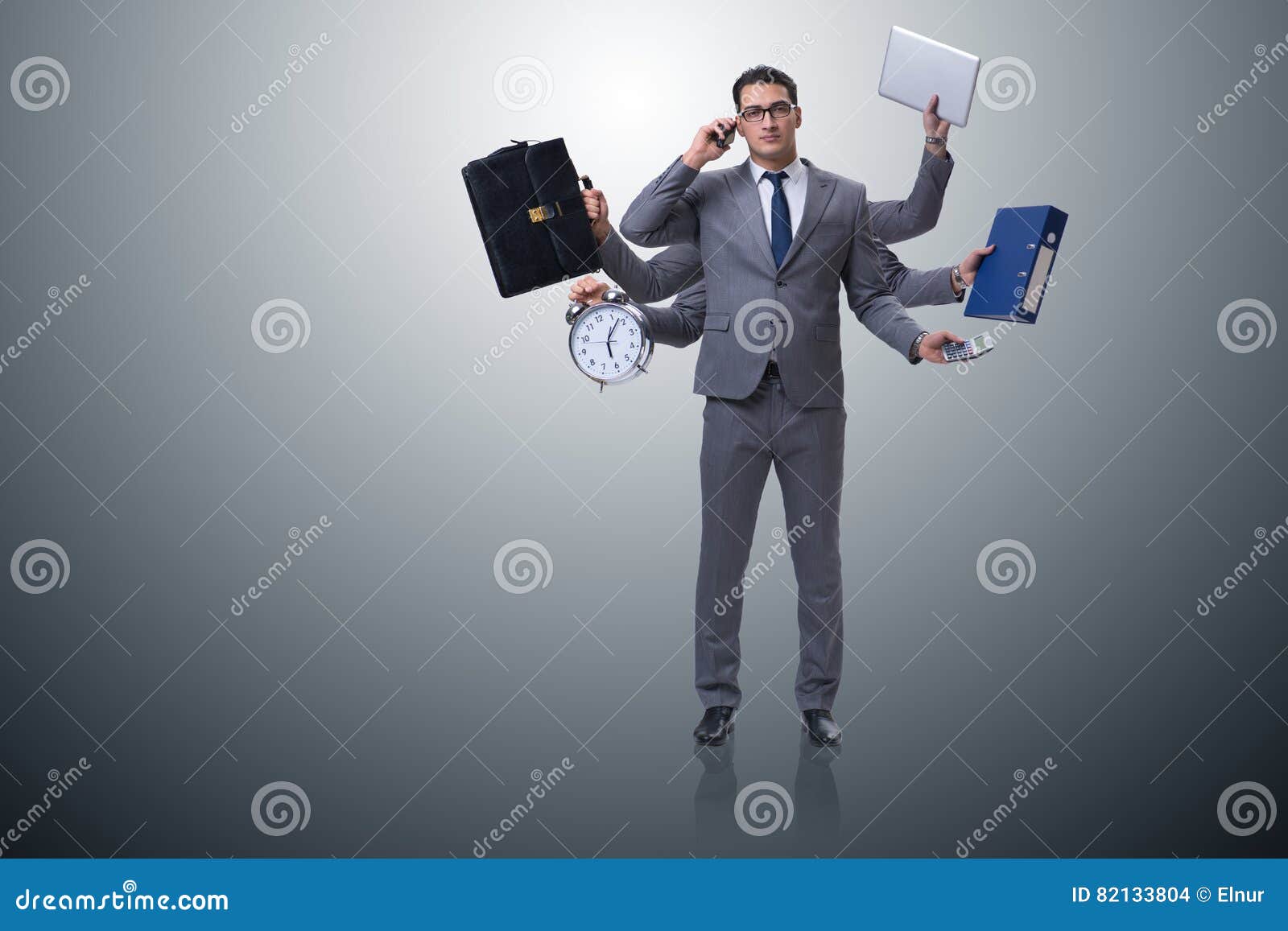 The Young Businessman in Multitasking Concept Stock Photo - Image of ...