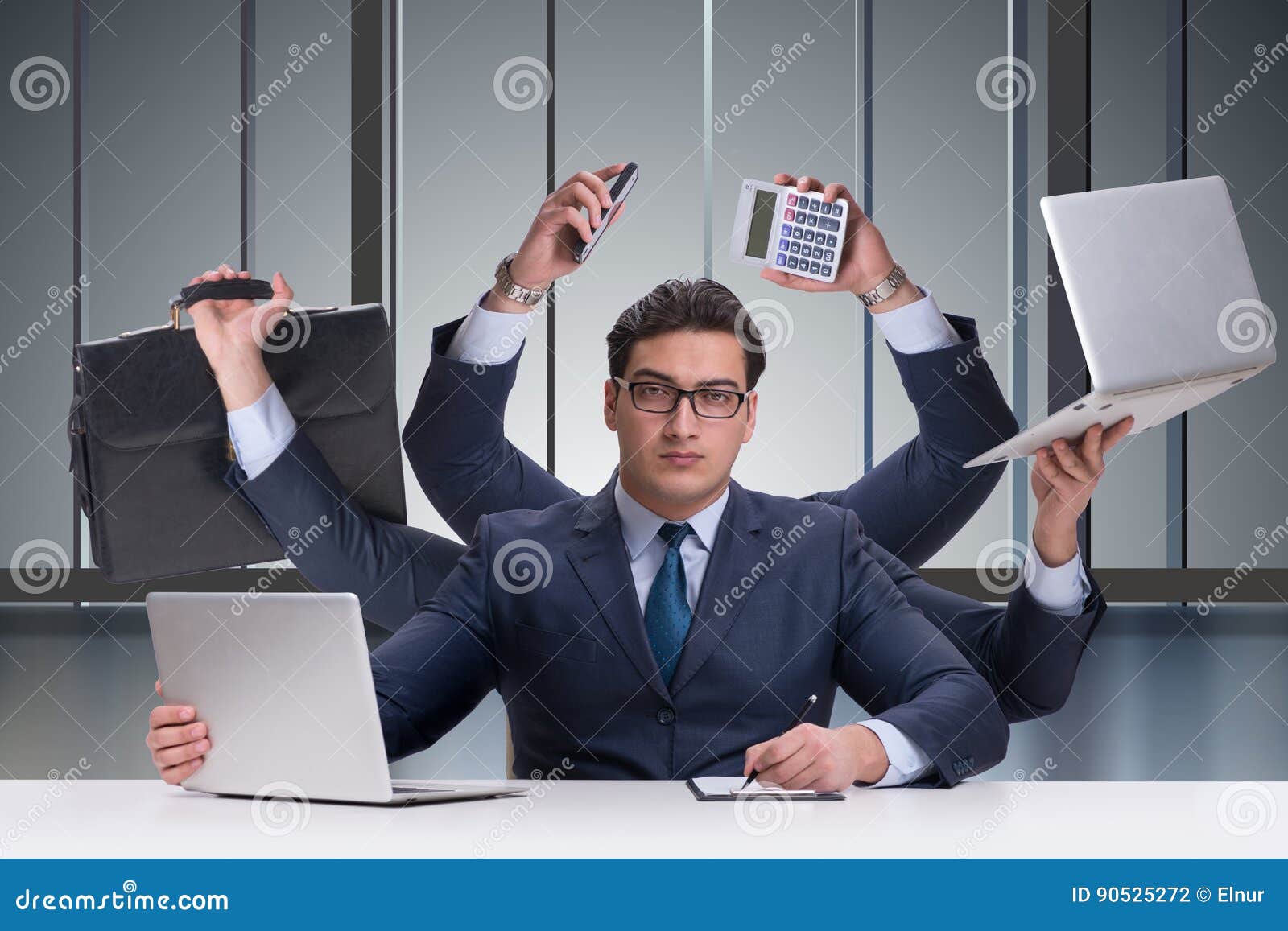The Young Businessman in Multitasking Concept Stock Photo - Image of ...