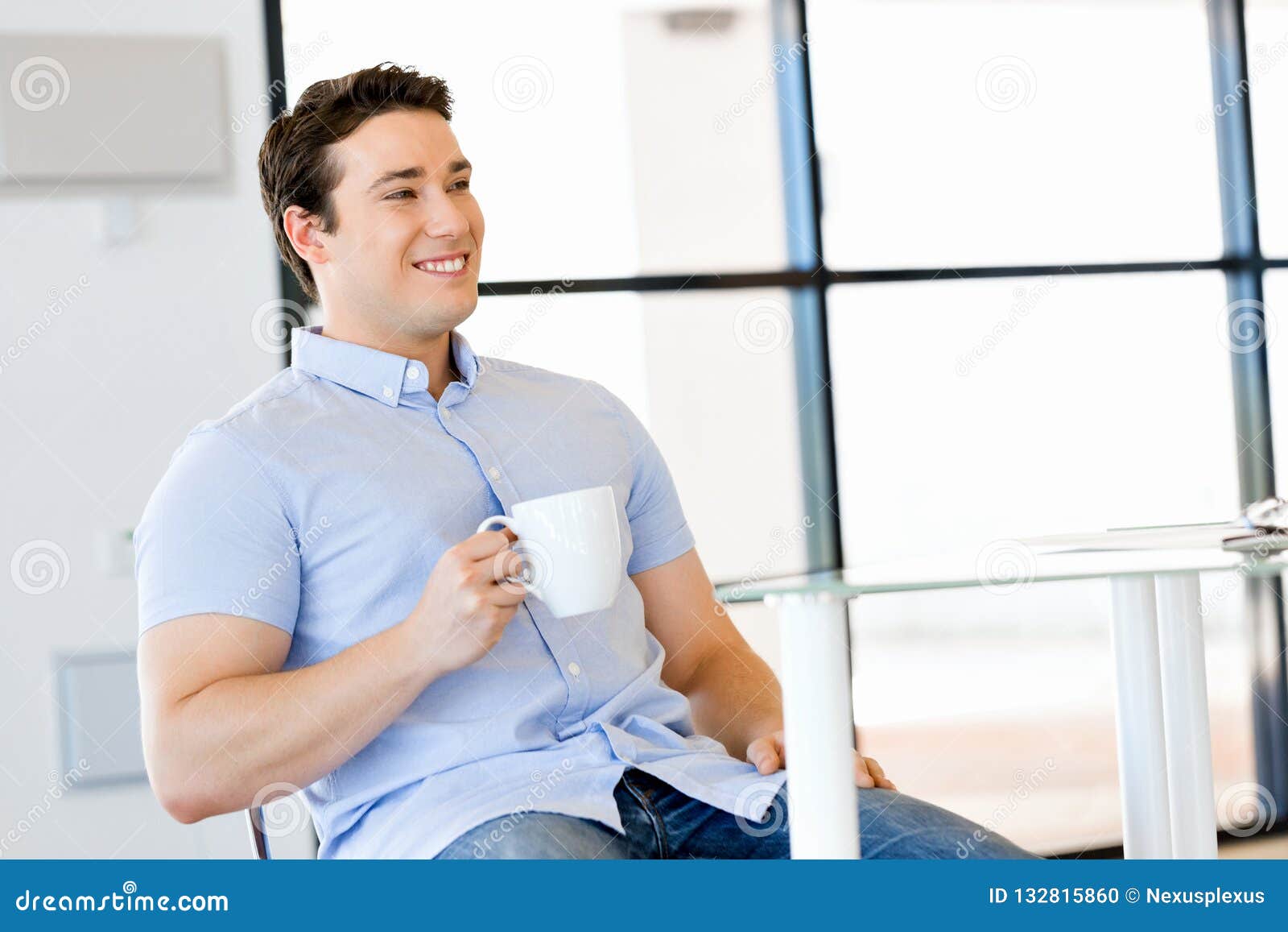 Young Businessman in Office with a Mug Stock Photo - Image of drinking ...