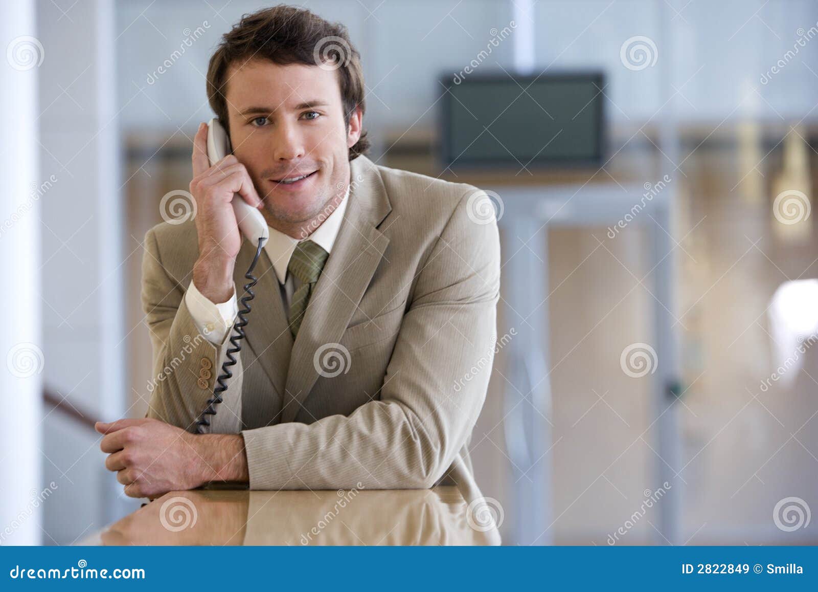 Young businessman on phone stock image. Image of intelligence - 2822849