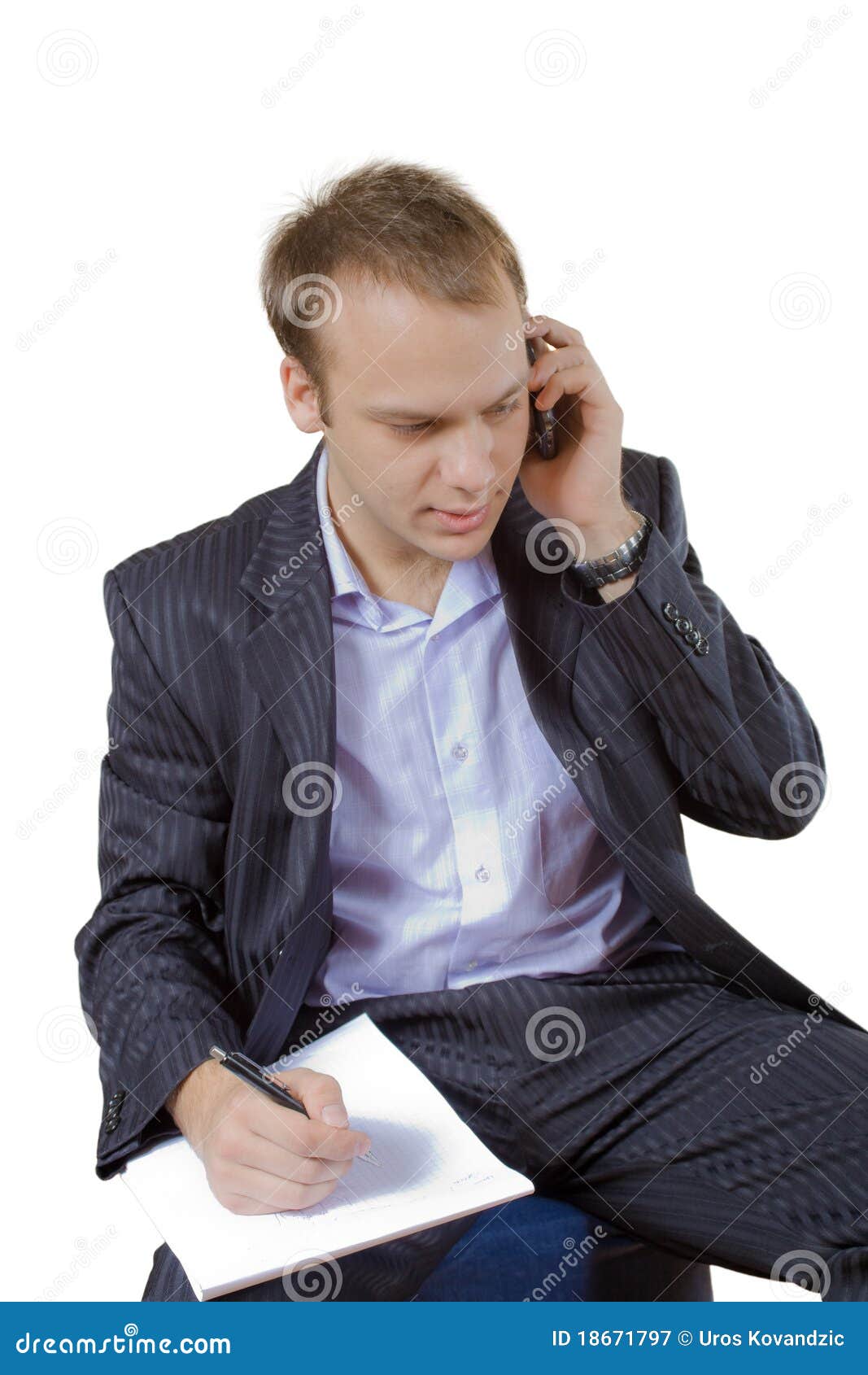 Young Businessman on the Phone Taking Notes Stock Image - Image of ...