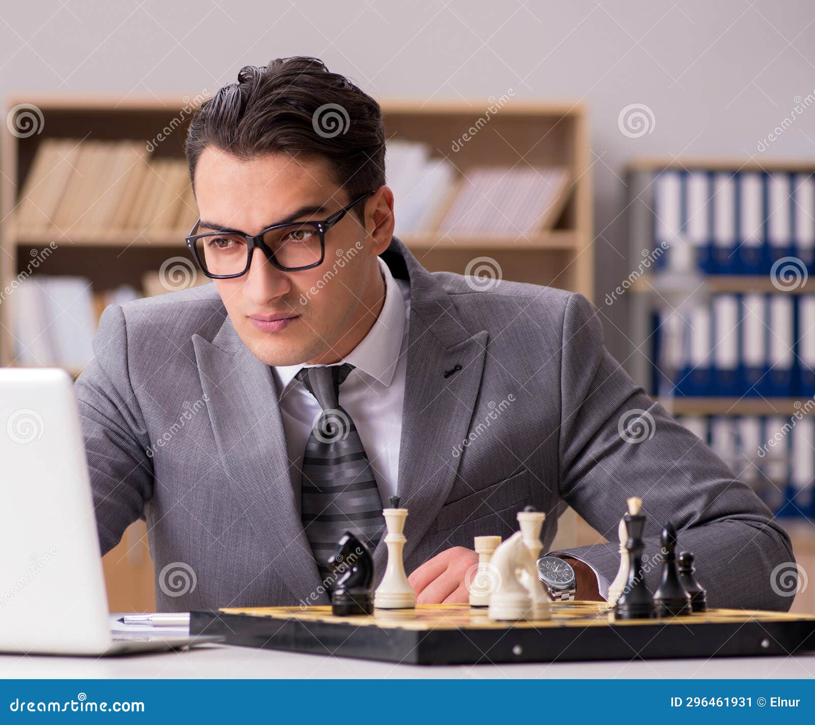 Young Businessman Playing Chess in the Office Stock Image - Image of ...