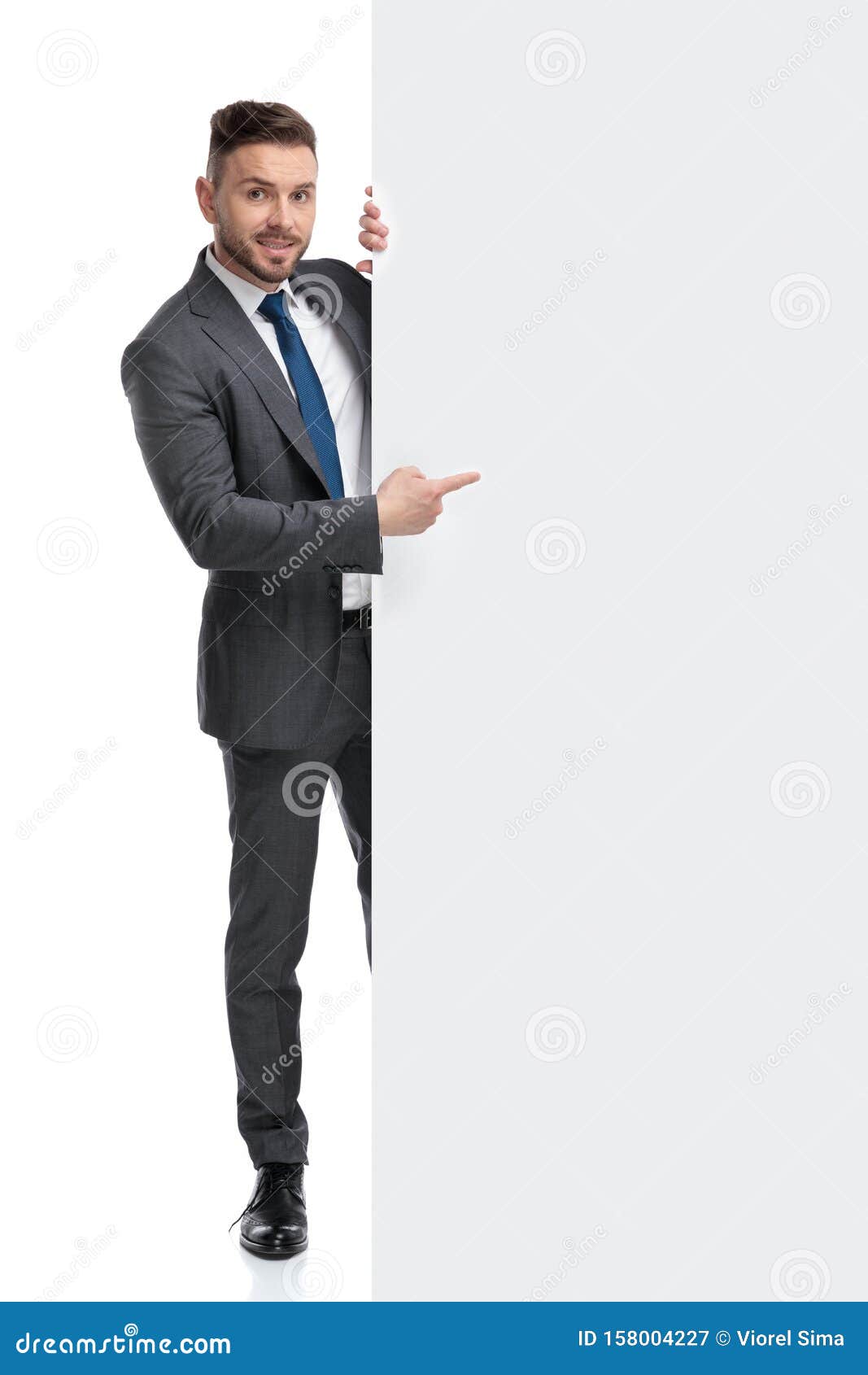 Young Businessman Pointing Finger at a Big Blank Board Stock Image ... Young Businessman Pointing Finger at a Big Blank Board Stock Image ...