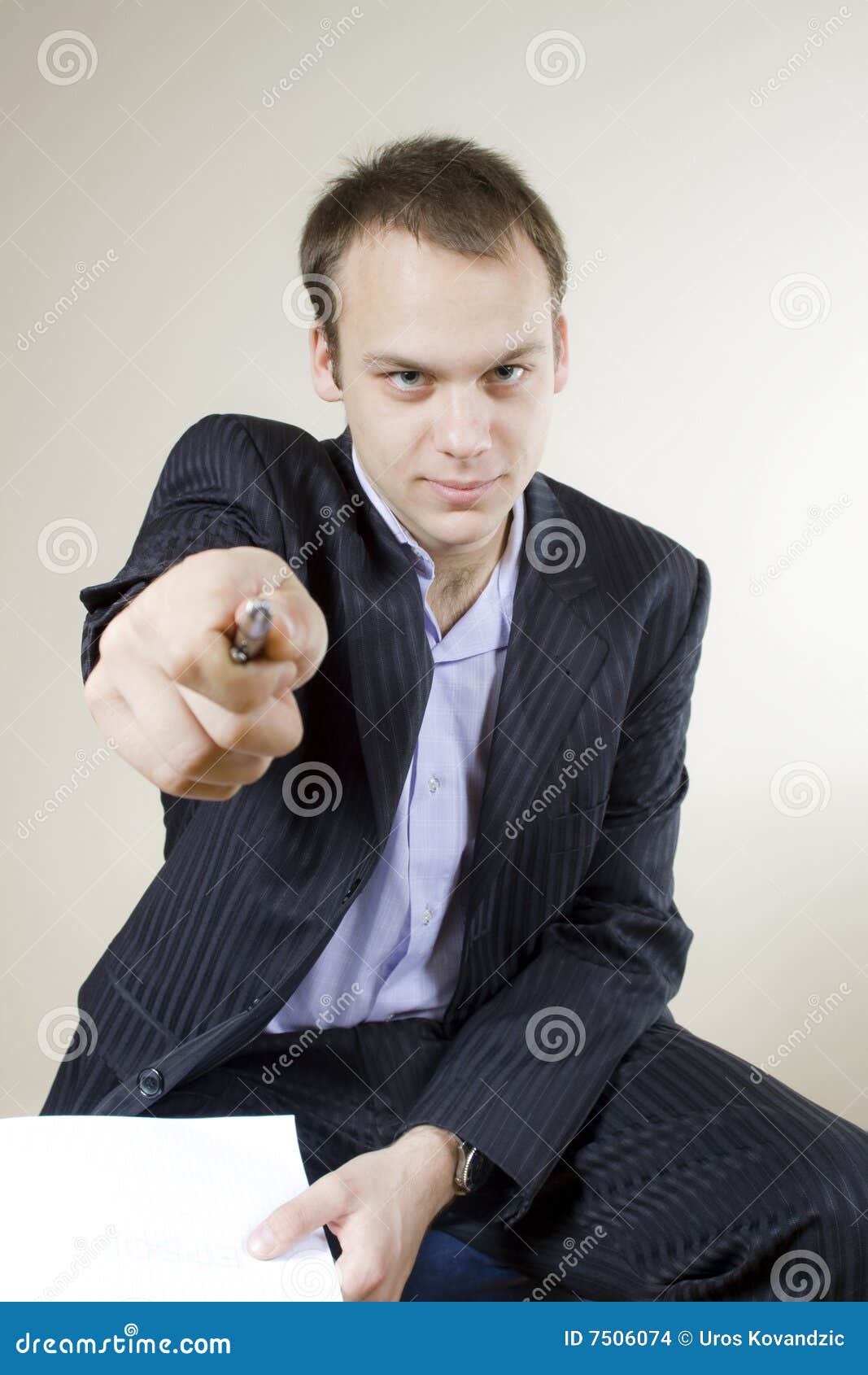 Young Businessman Pointing His Pen in the Camera Stock Photo - Image of ...