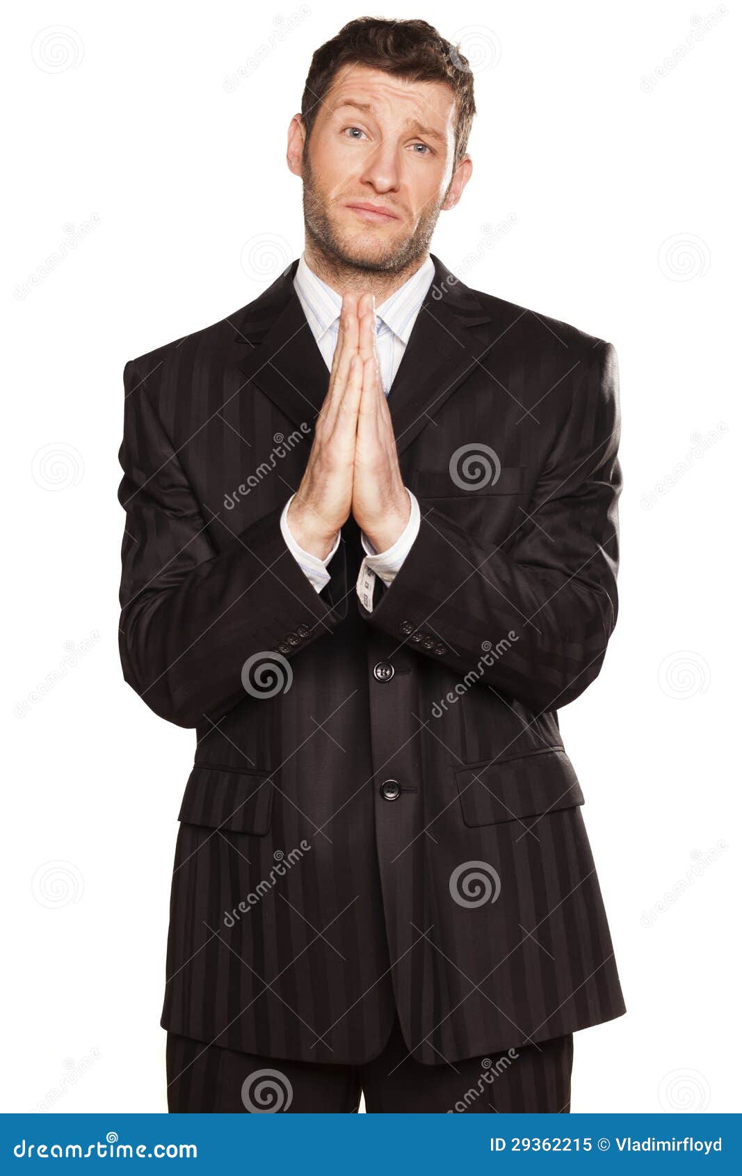 Young businessman praying stock image. Image of expression - 29362215