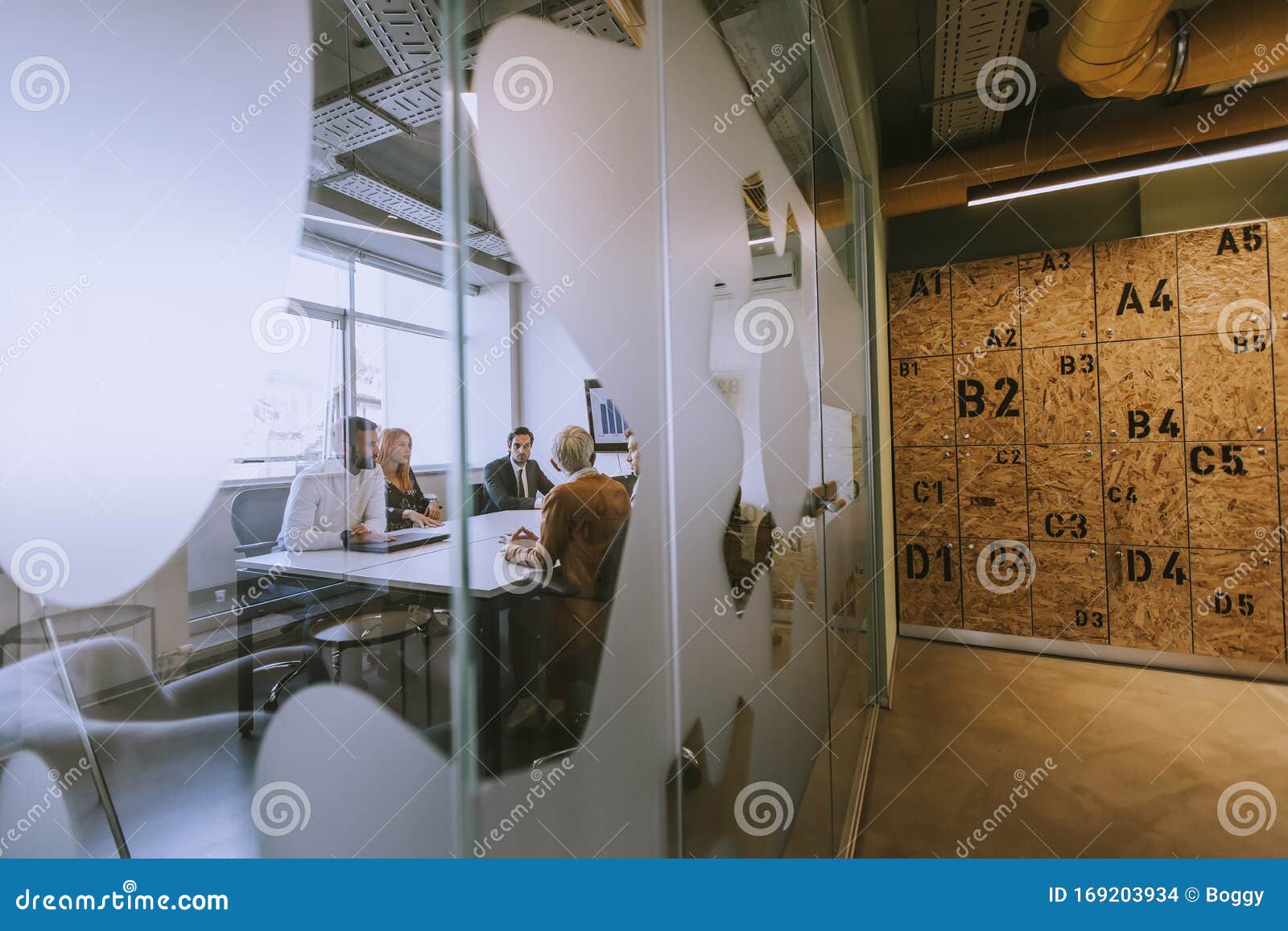 Young Businessman Presenting Project Strategy Showing Ideas on ...