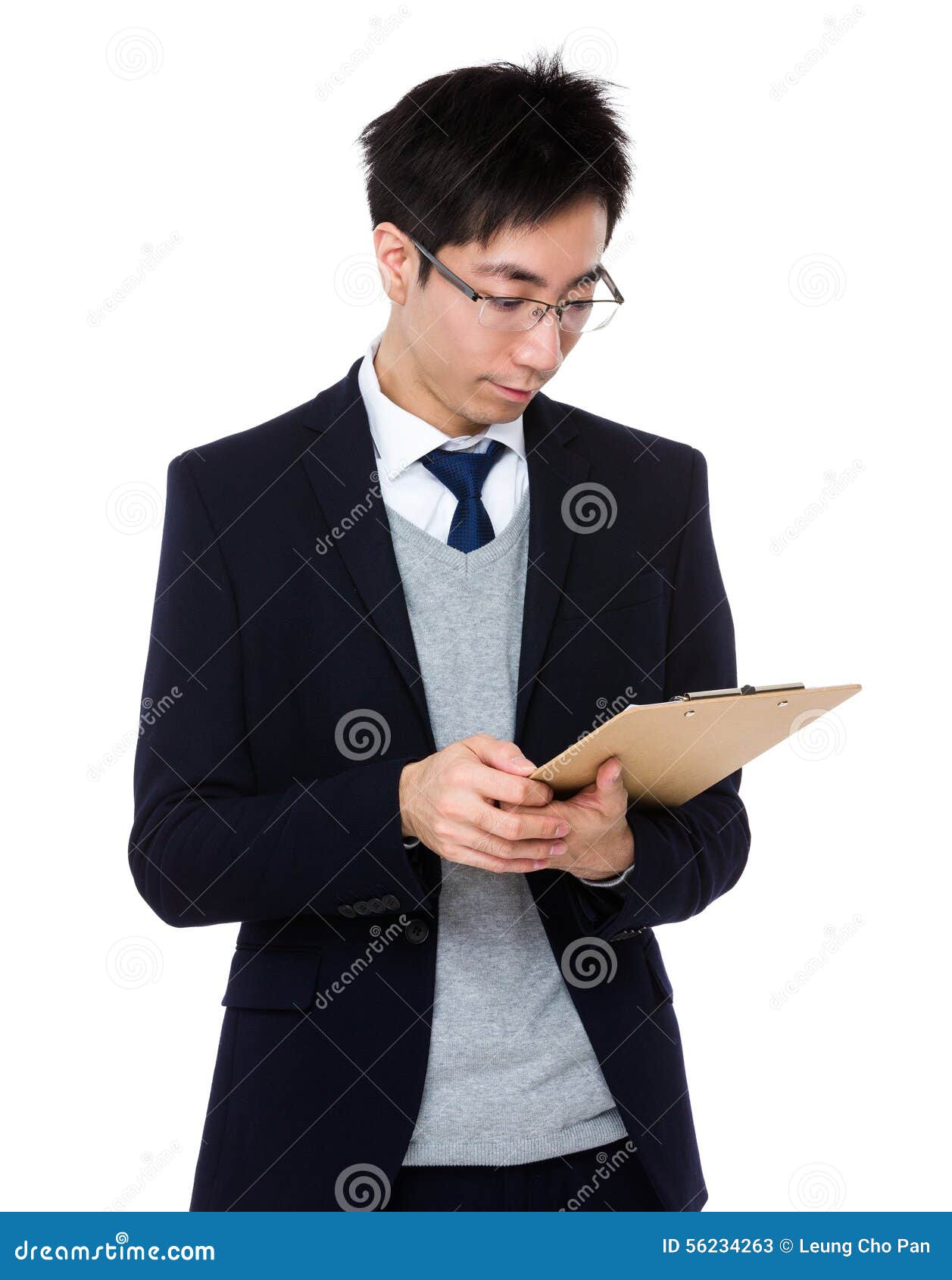 Young Businessman Read on the Clipboard Stock Image - Image of adult ...