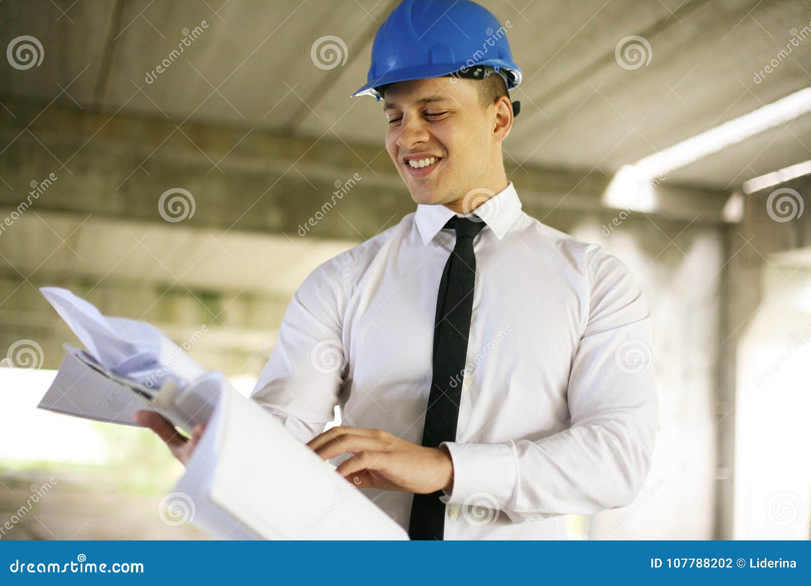 Young Smiling Businessman Reading Document. Stock Photo - Image of ... Young Smiling Businessman Reading Document. Stock Photo - Image of ...