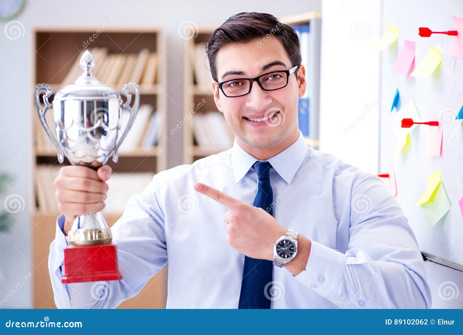 The Young Businessman Receiving Prize Cup in Office Stock Photo - Image ...