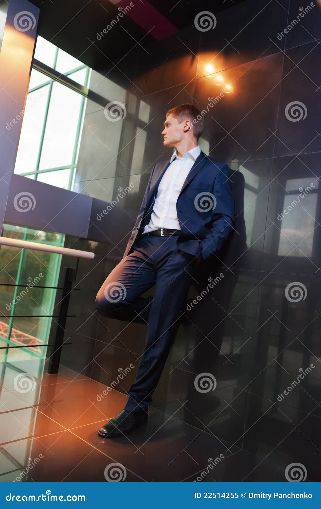 Young Businessman Resting on Wall Stock Image - Image of good, model ...