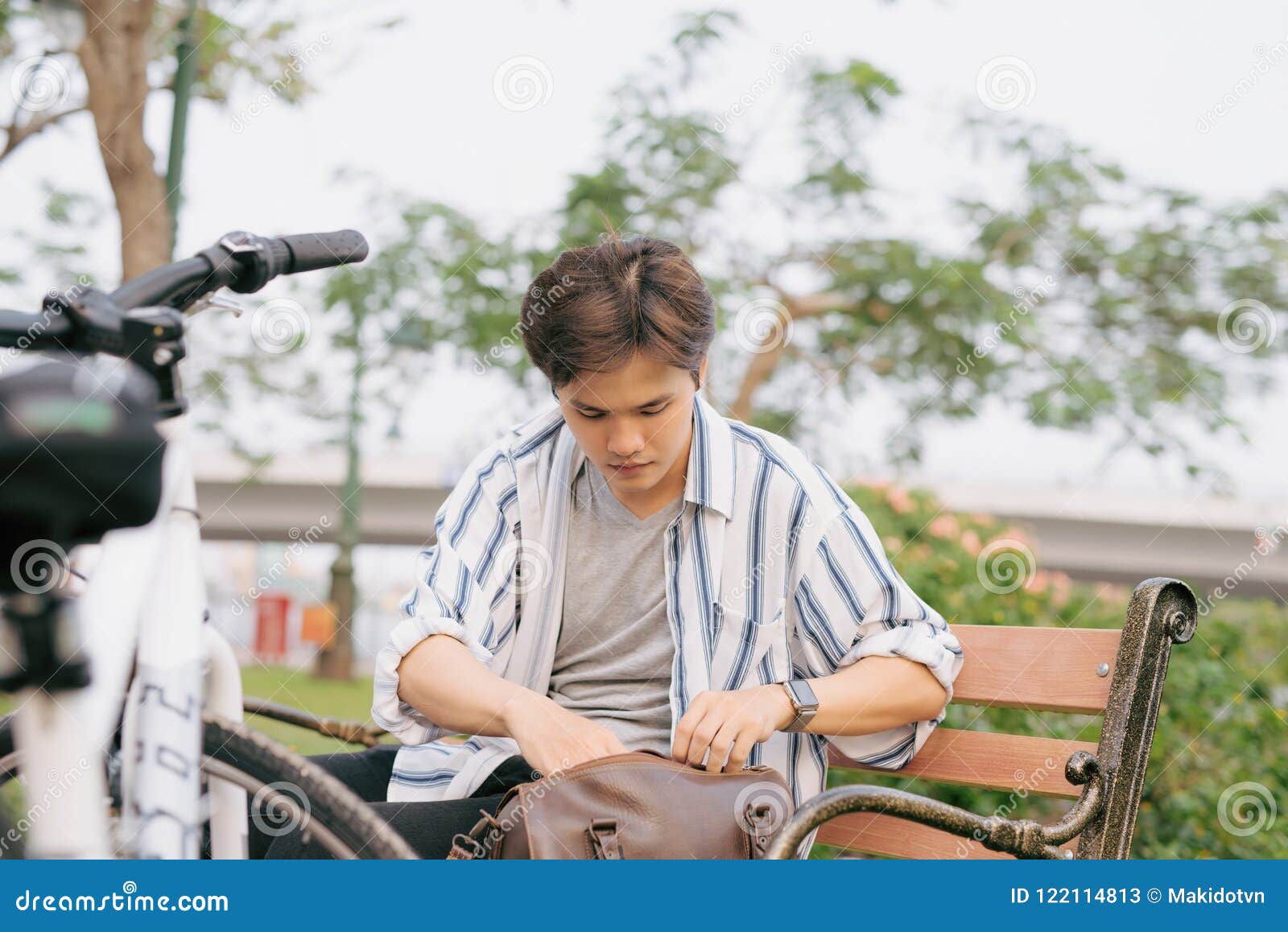 Young Businessman Searching Items in His Bag Stock Image - Image of ...