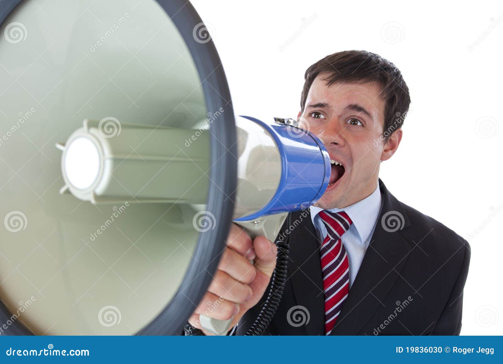 Young Businessman Shouting Loudly into Megaphone Stock Photo - Image of ...