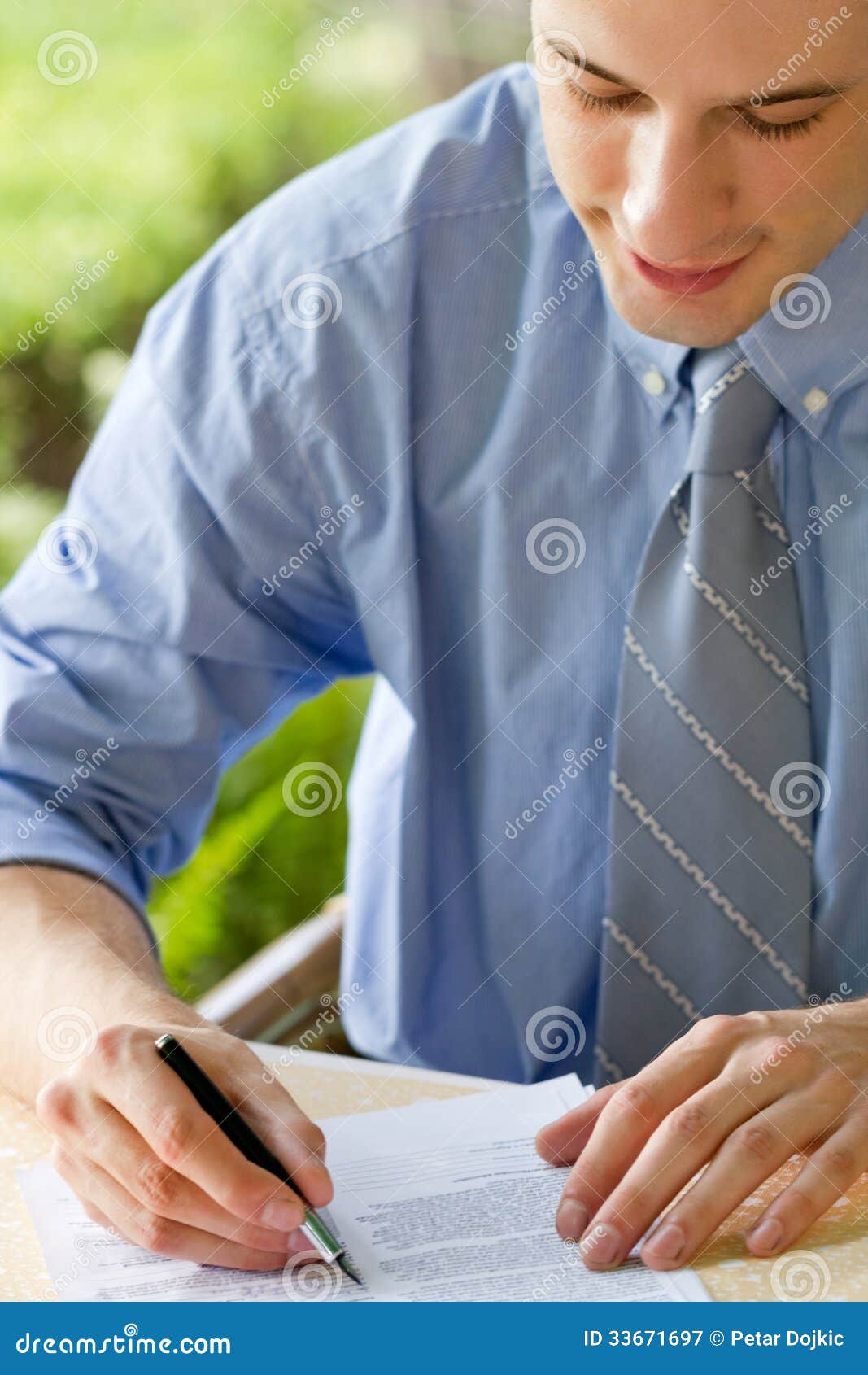 Young Businessman Signs Document Stock Image - Image of partner, result ...