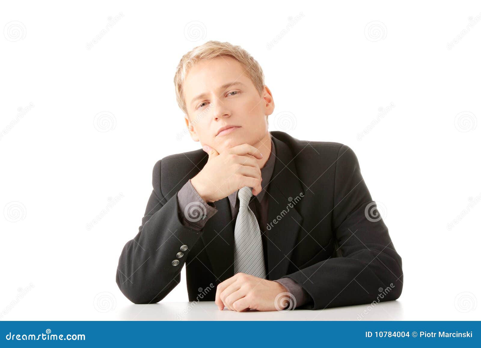 Young Businessman Sitting Behind the Desk Stock Photo - Image of ...