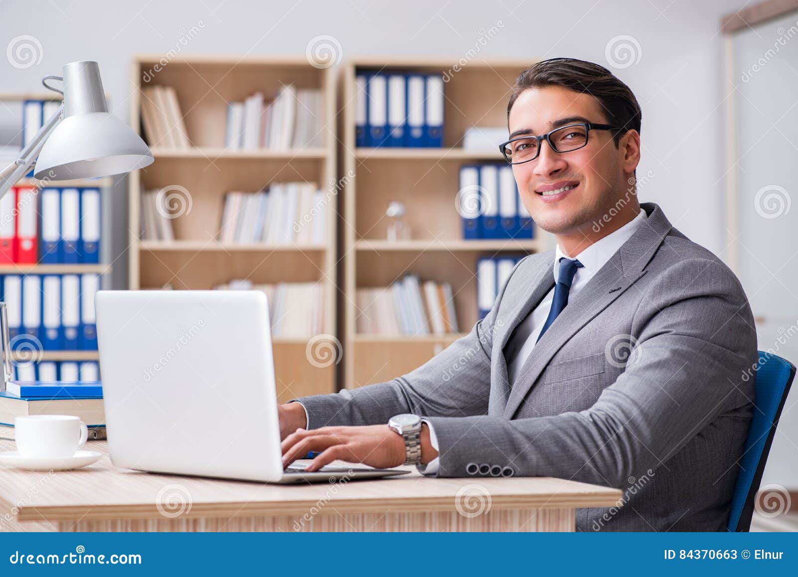 The Young Businessman Sitting at the Desk Stock Image - Image of screen ...