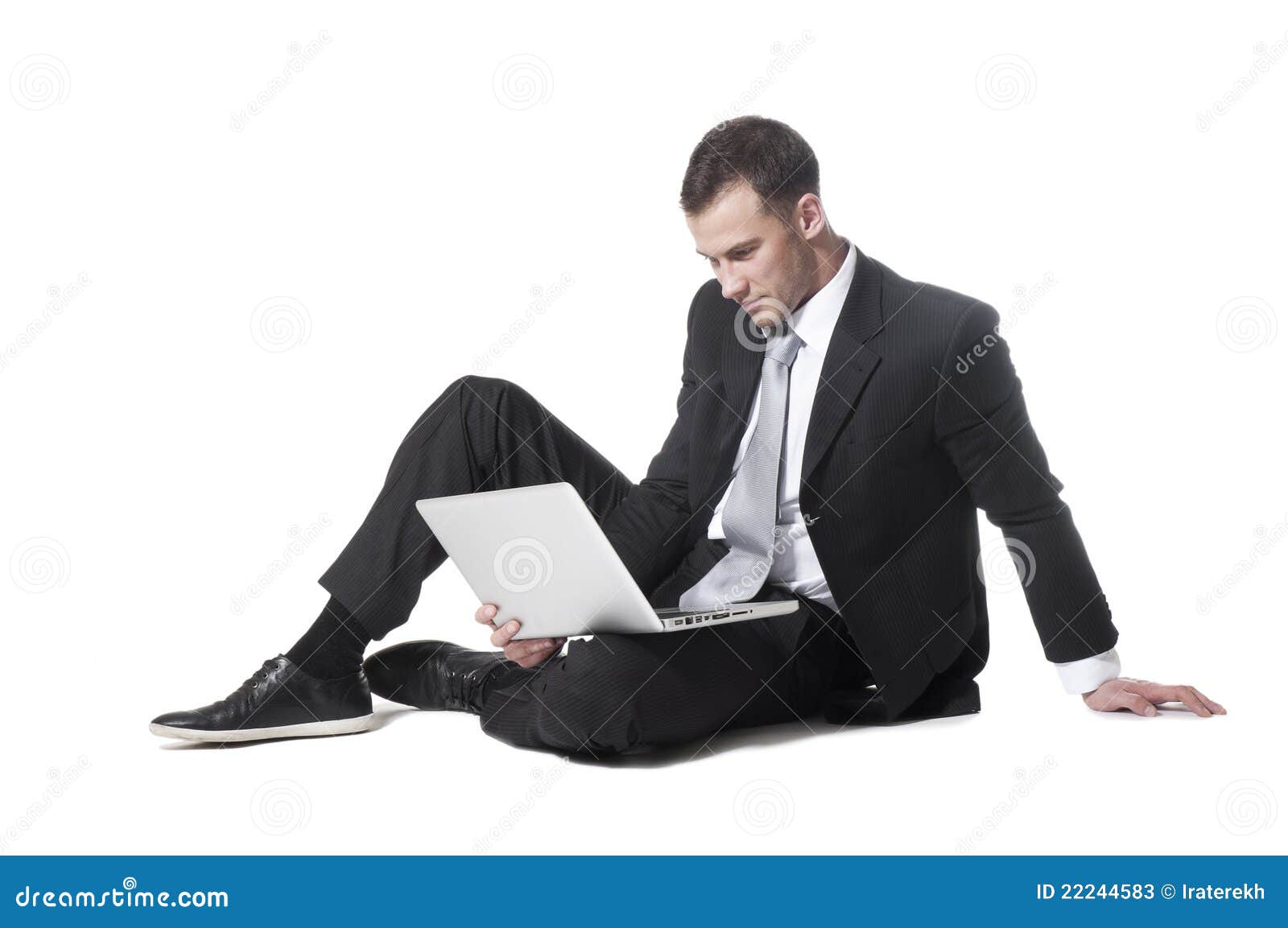 Young Businessman Sitting With Laptop Stock Image - Image of full ...